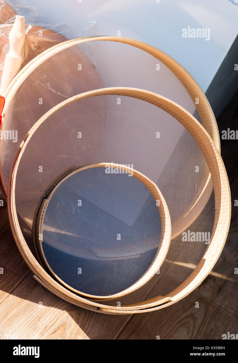 Traditional type sieve made of wood Stock Photo - Alamy