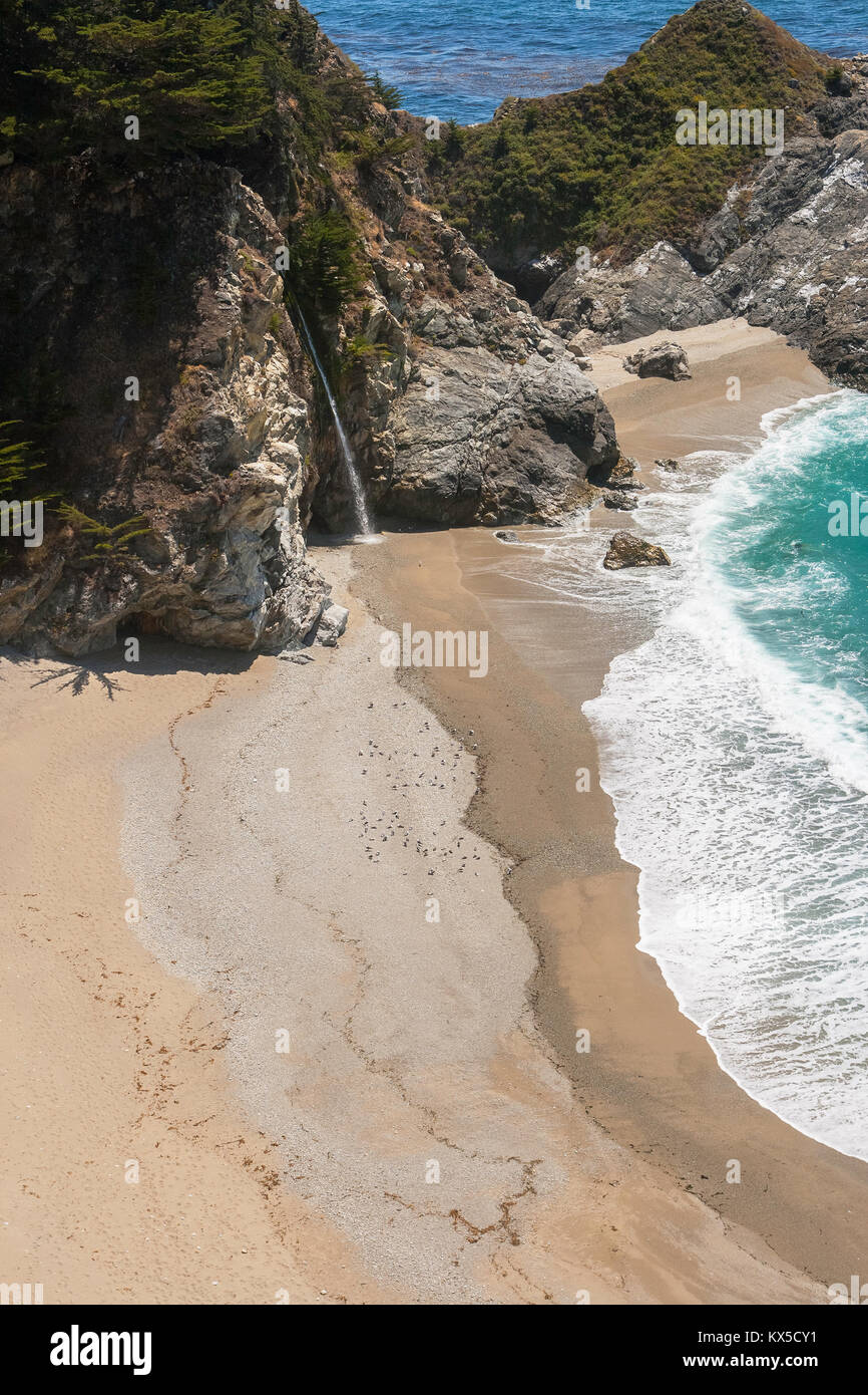 McWay Falls in McWay Creek. Beautiful pacific sand beach with waterfall ...
