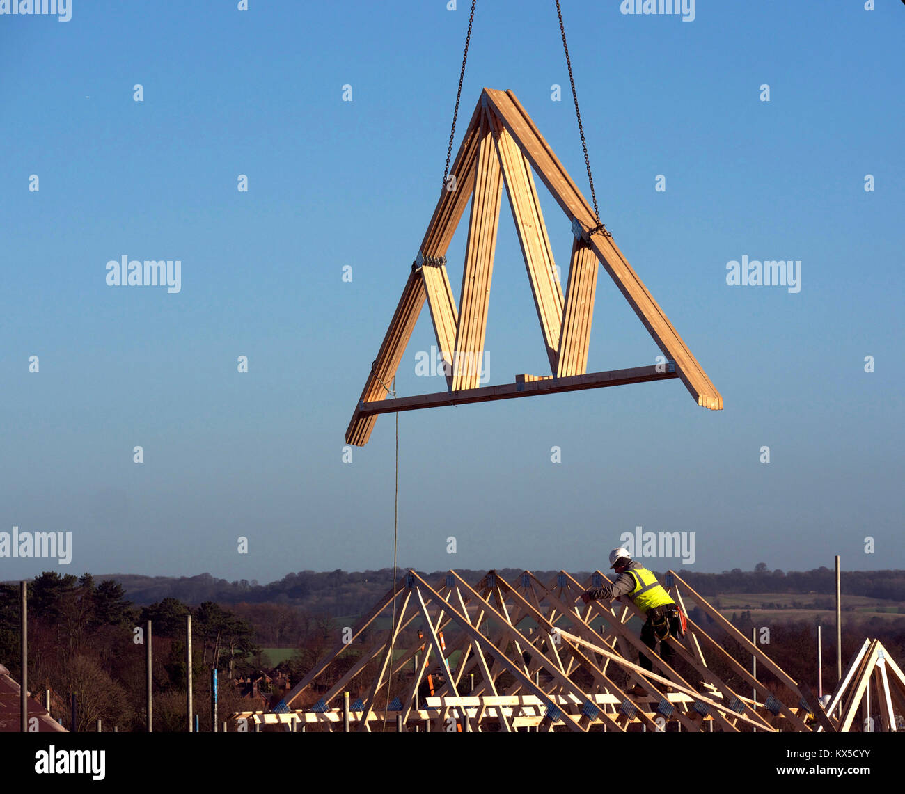Wooden roof A frame being lifted on to roof of new house, Grantham ...