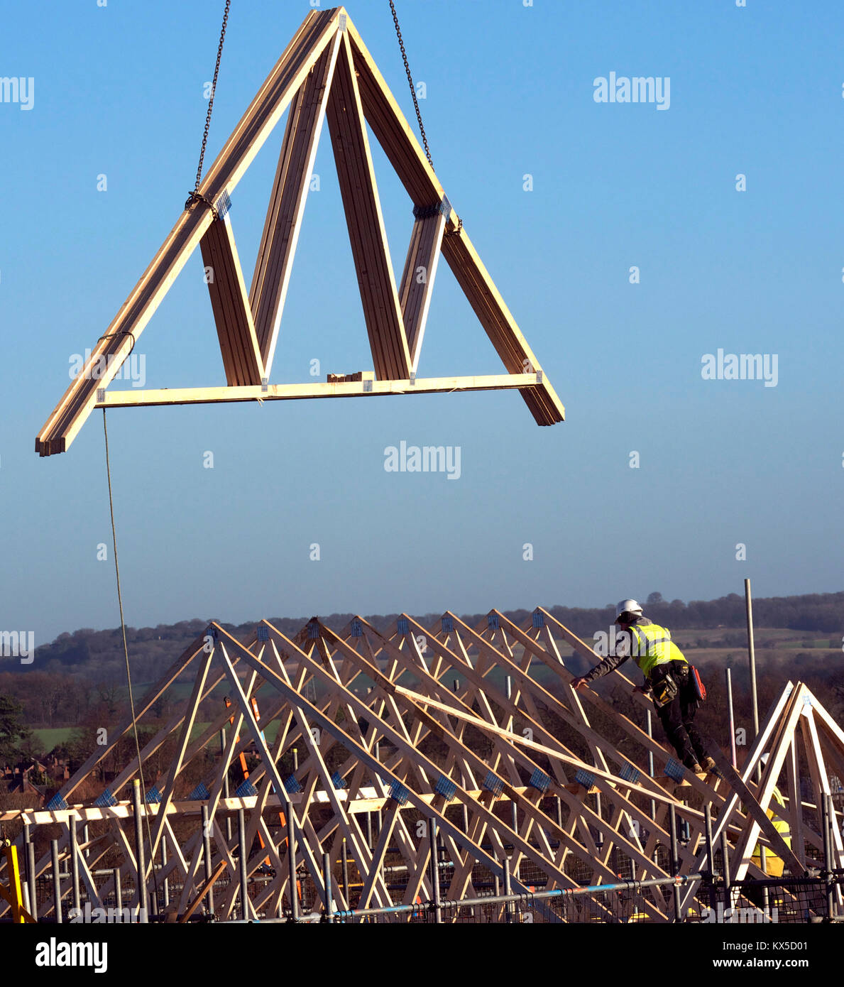Wooden roof A frame being lifted on to roof of new house, Grantham ...