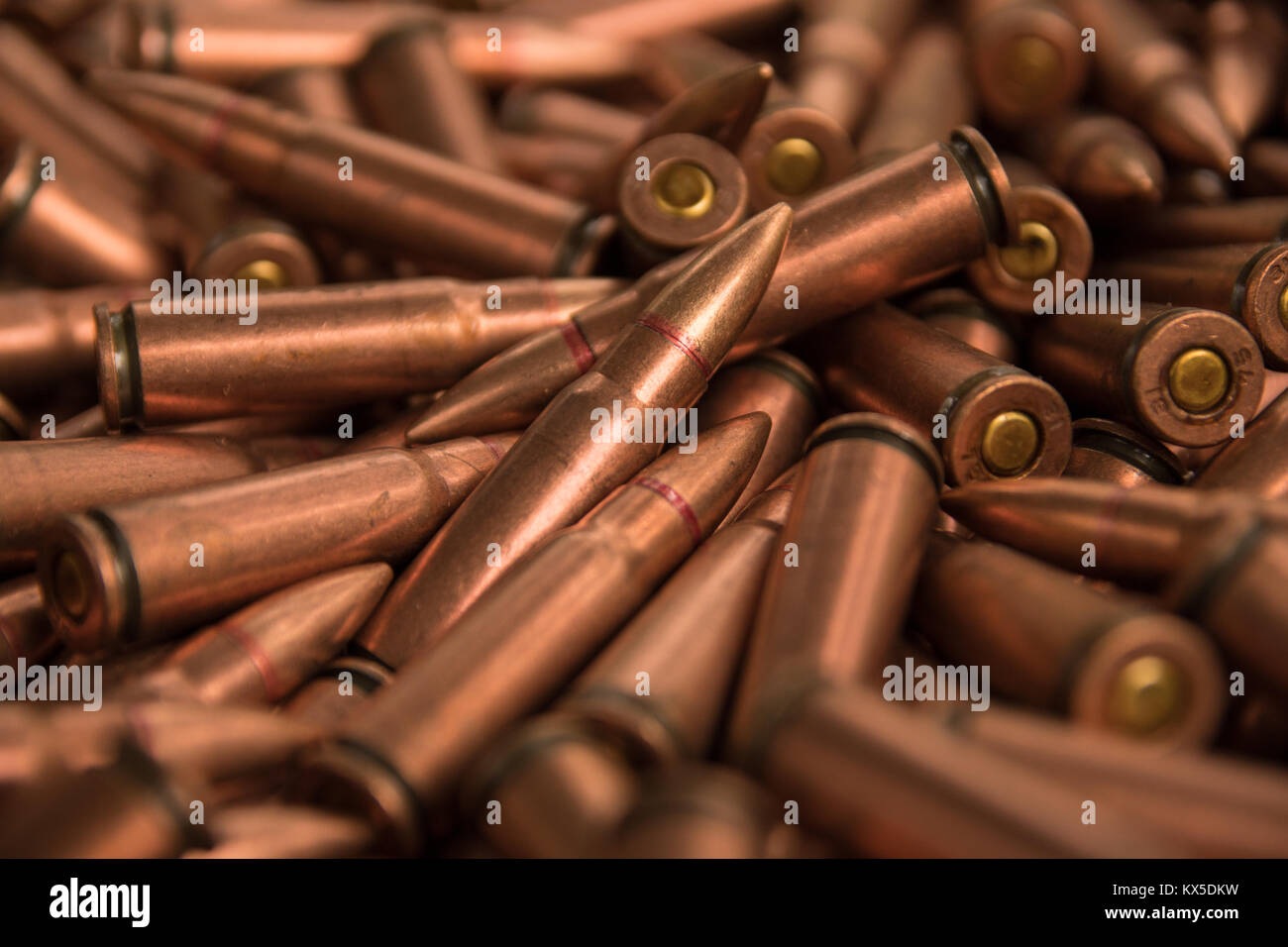 close up of ammunition fo ak-47 in color of copper Stock Photo - Alamy
