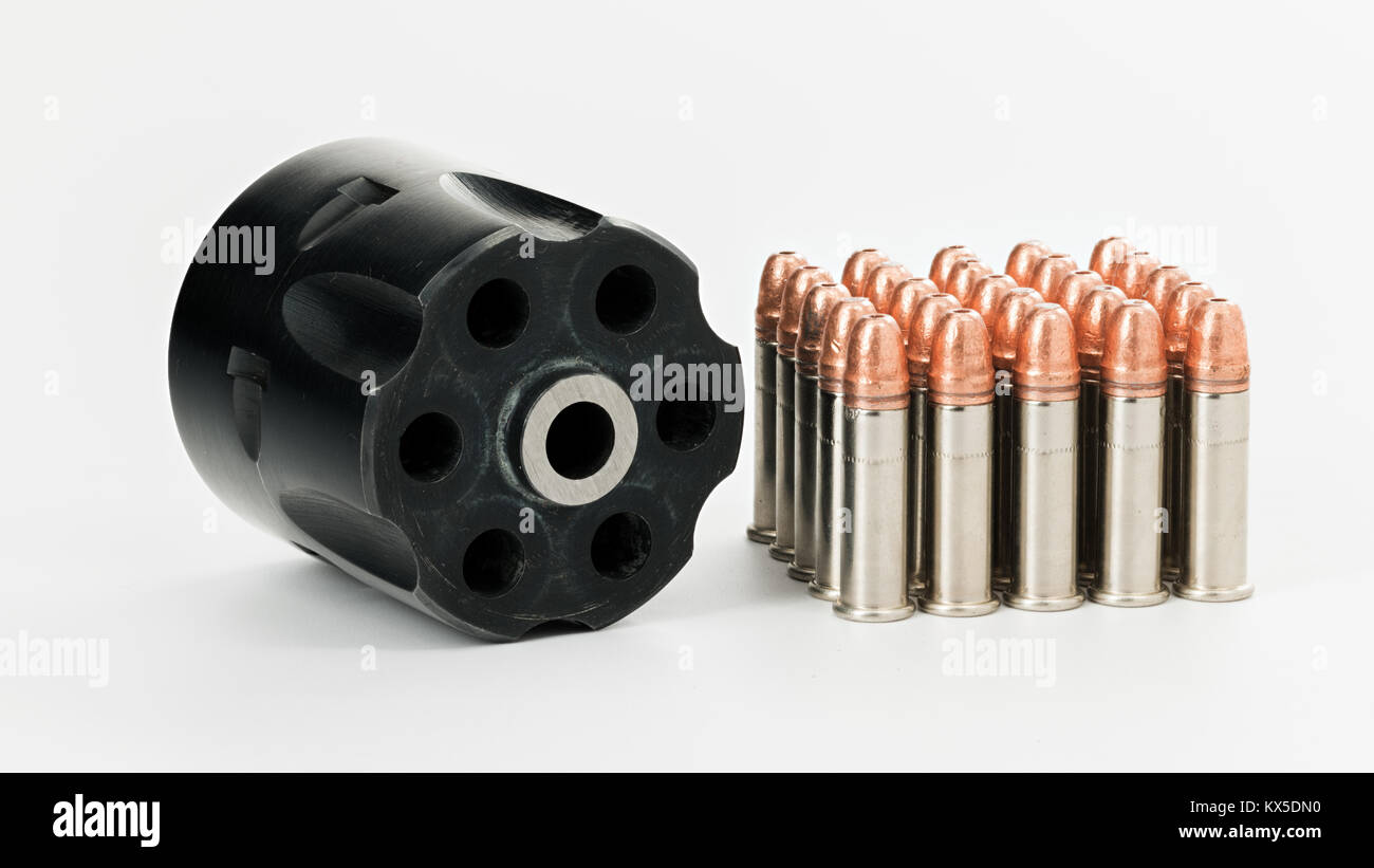 Bullets and a revolver for a pistol close up Stock Photo - Alamy