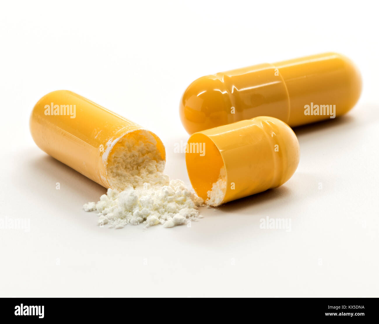 Powdered medication visible from the inside of a capsule Stock Photo ...