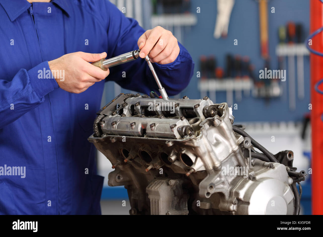 Mechanic hands working engine hi-res stock photography and images - Alamy
