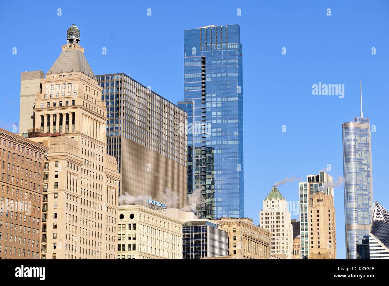 A crystal clear atmosphere and steam vapors escaping buildings provide ...