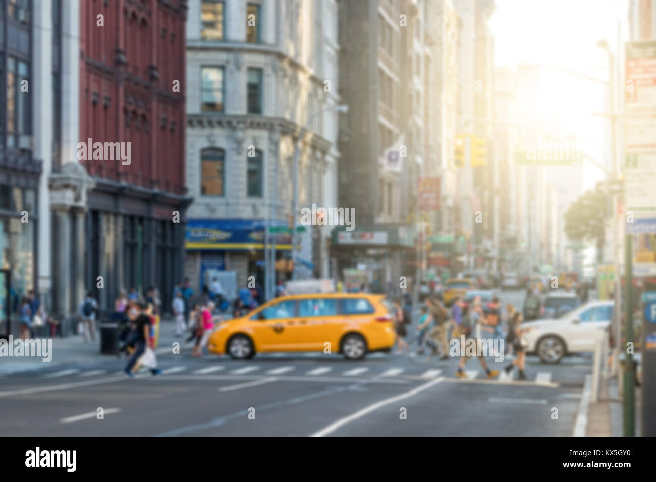 New York City street scene with cars and people in Manhattan blurred ...