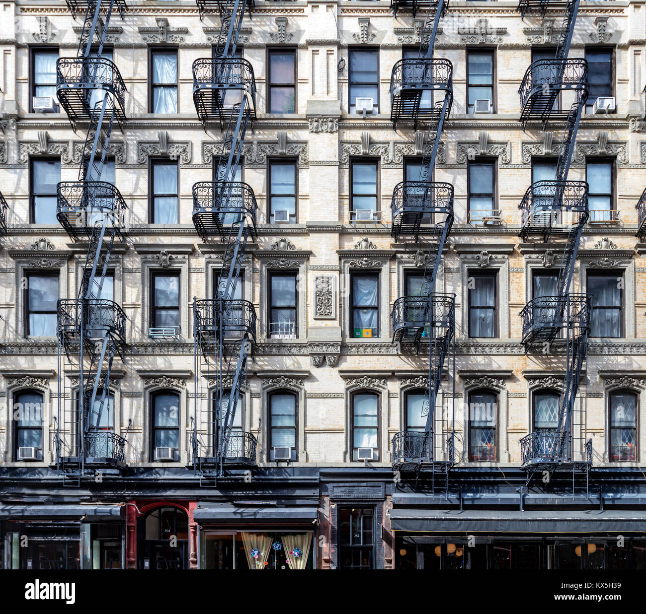 Wall of windows on an old apartment building in the Lower East Side ...