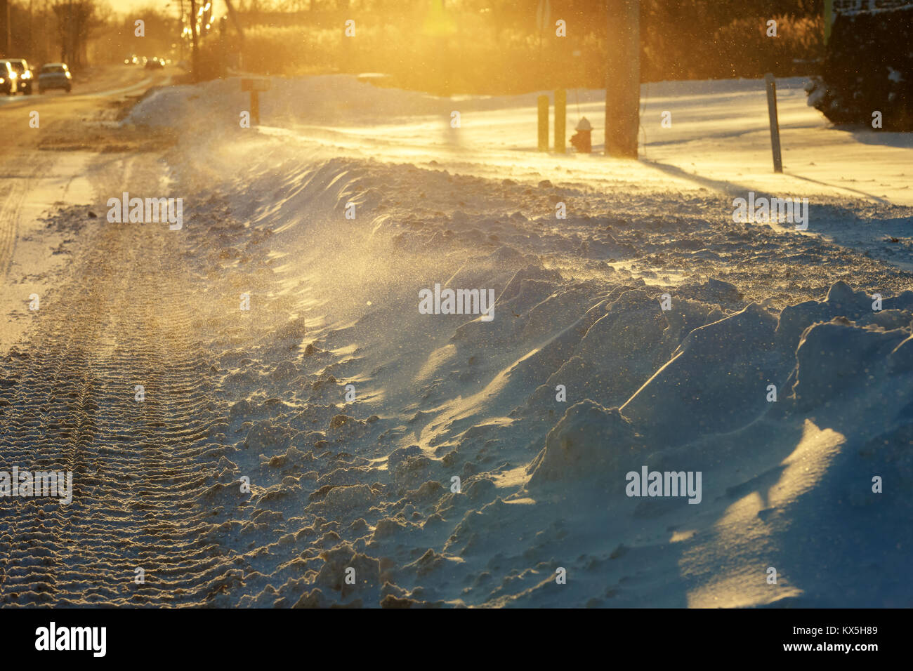The Winter traffic, in snowstorm street filled with fresh snow during a ...
