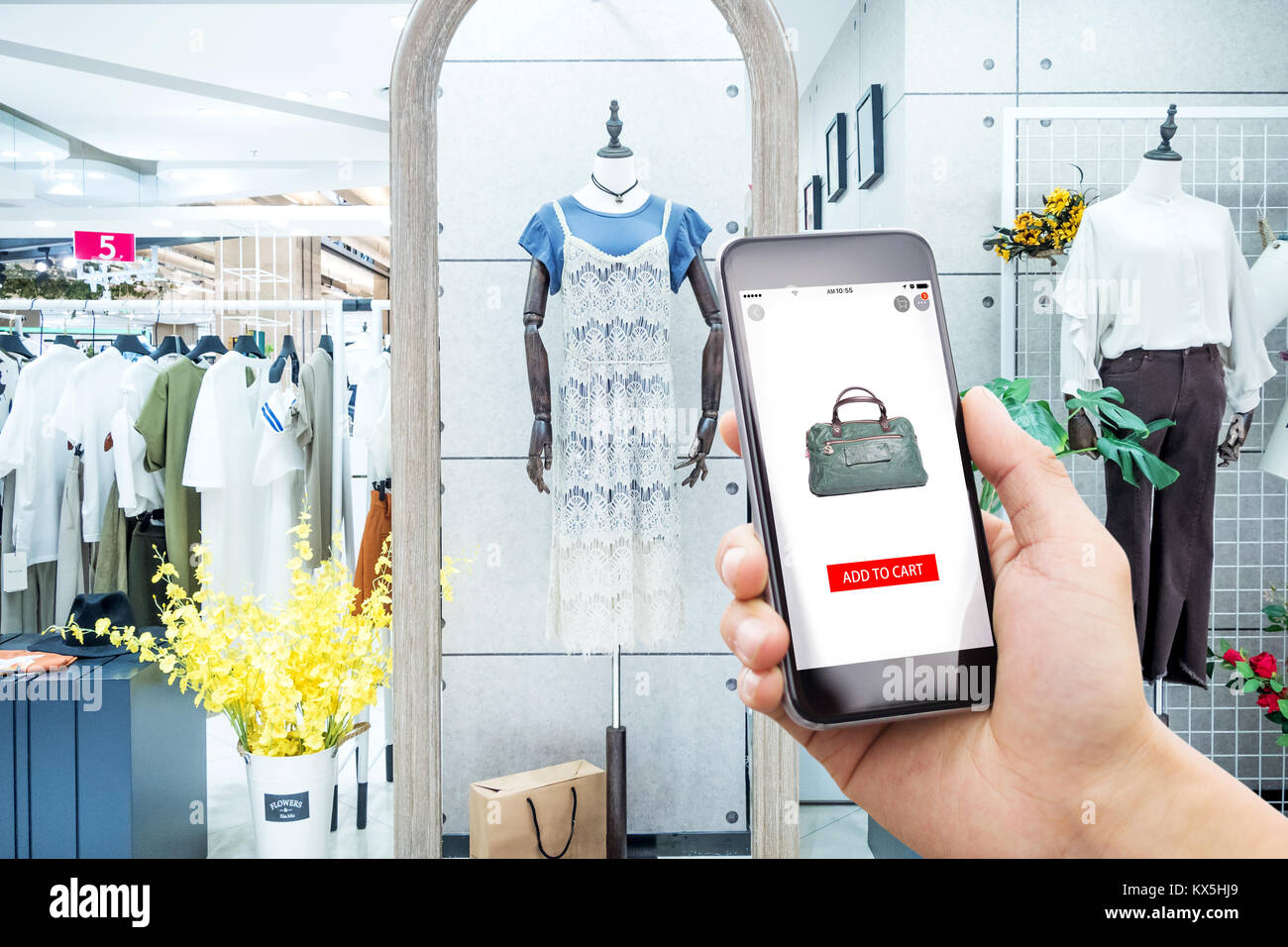 online shopping in modern shopping mall with mobile phone Stock Photo ...