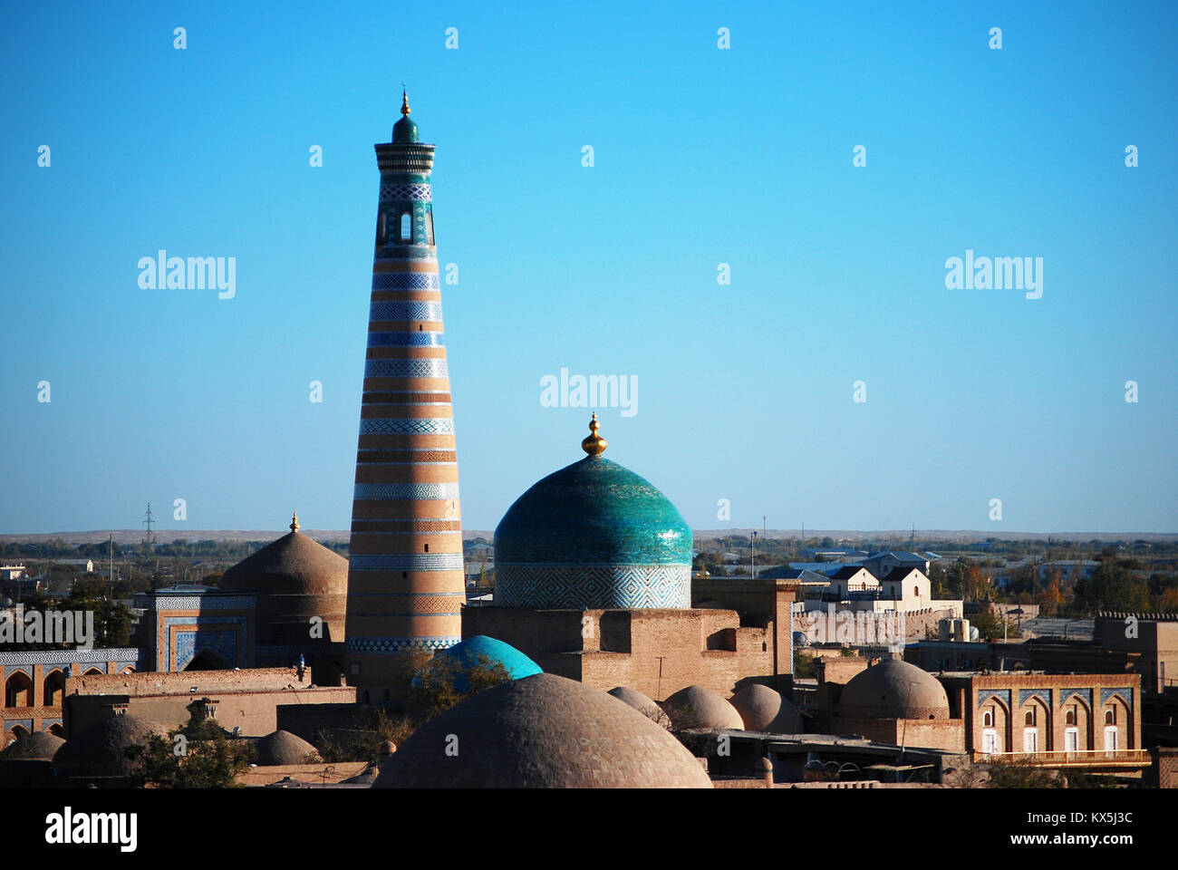 Landscape view of Khiva with Islam Khoja Minaret and mosque, Uzbekistan ...