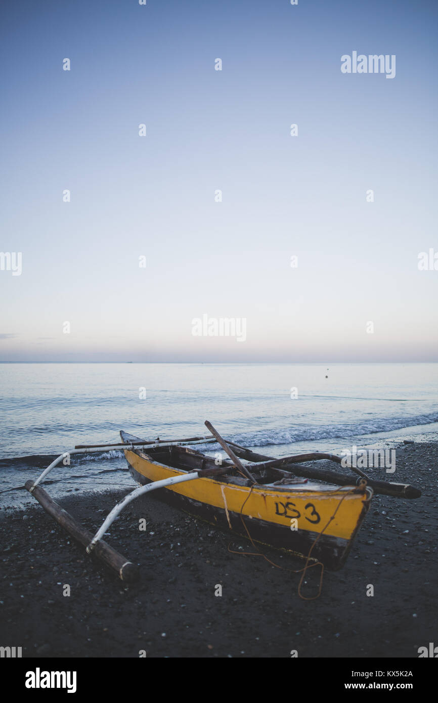 Boat on a shore in Mindoro, Philippines Stock Photo - Alamy