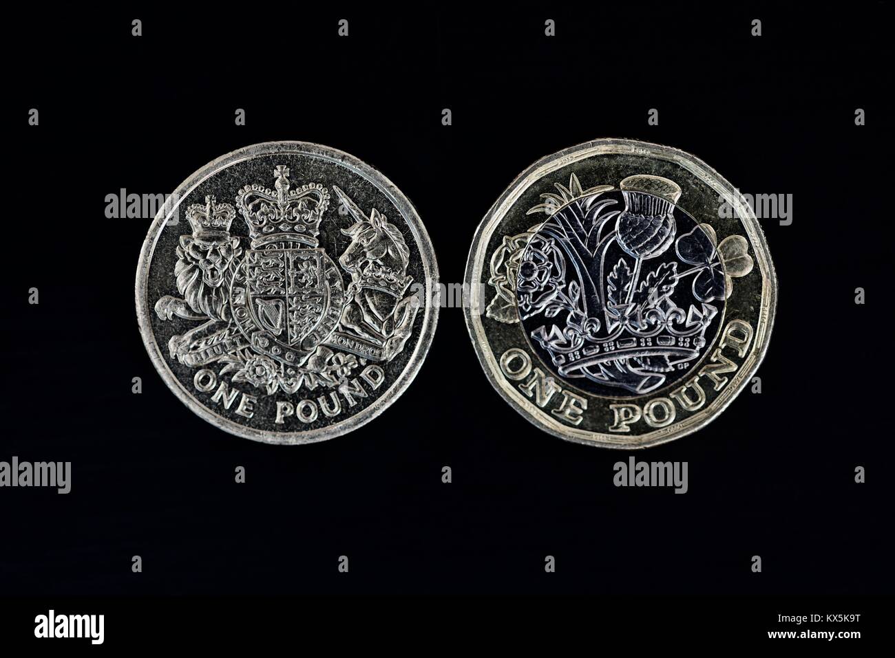 The old one pound coin and the new 12-sided one pound coin Stock Photo ...
