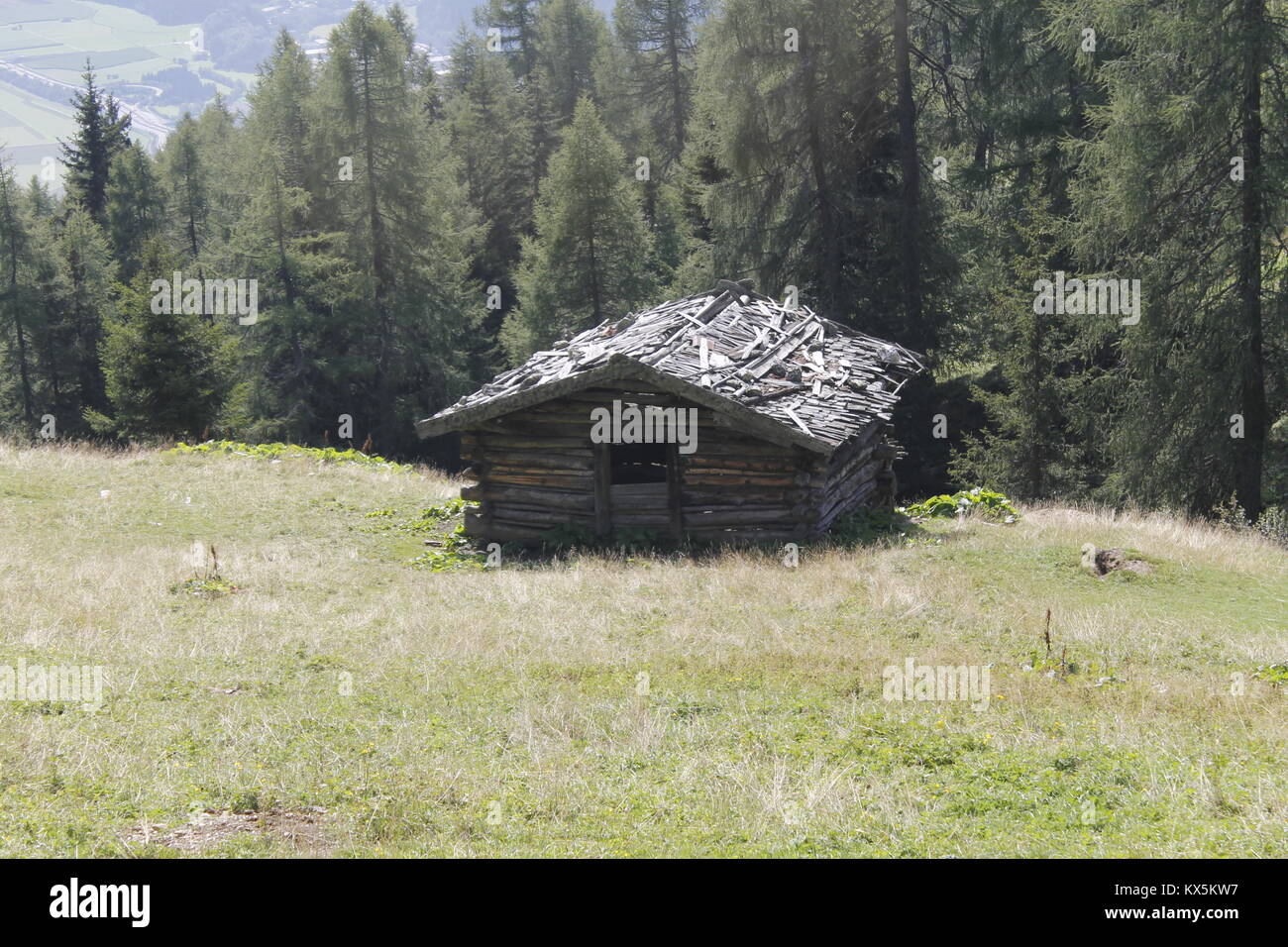typical mountain huts on the Alps in Italy Stock Photo - Alamy