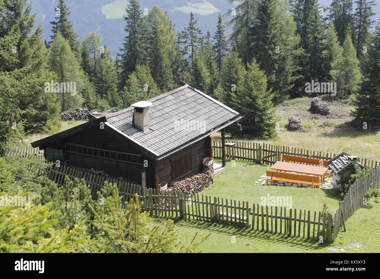 typical mountain huts on the Alps in Italy Stock Photo - Alamy