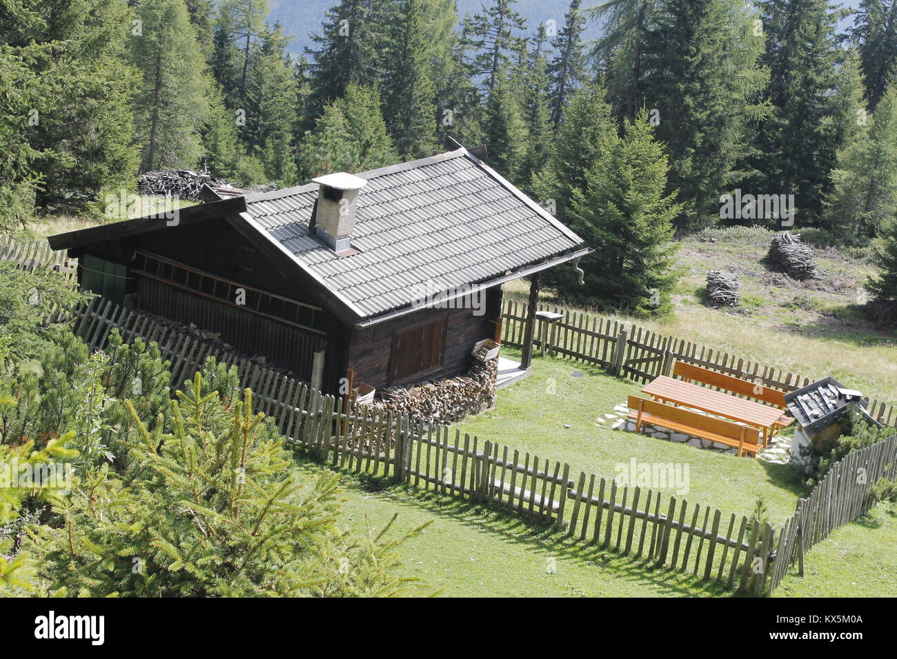 typical mountain huts on the Alps in Italy Stock Photo - Alamy