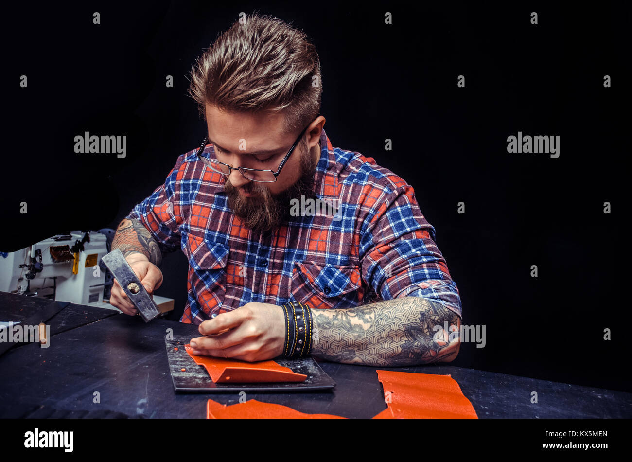 Leather Tanner working with leather Stock Photo - Alamy