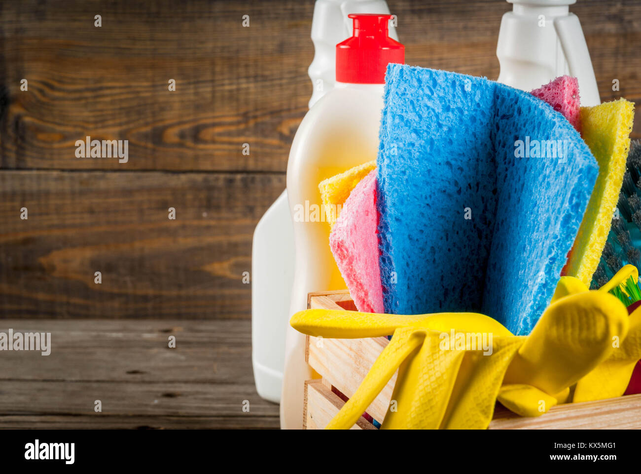 Spring cleaning concept with supplies, house cleaning products pile ...