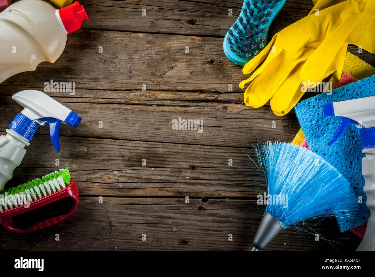 Spring cleaning concept with supplies, house cleaning products pile ...