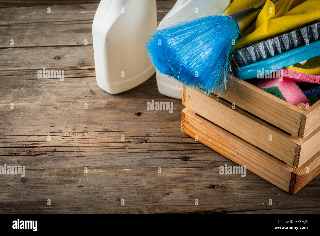 Spring cleaning concept with supplies, house cleaning products pile ...