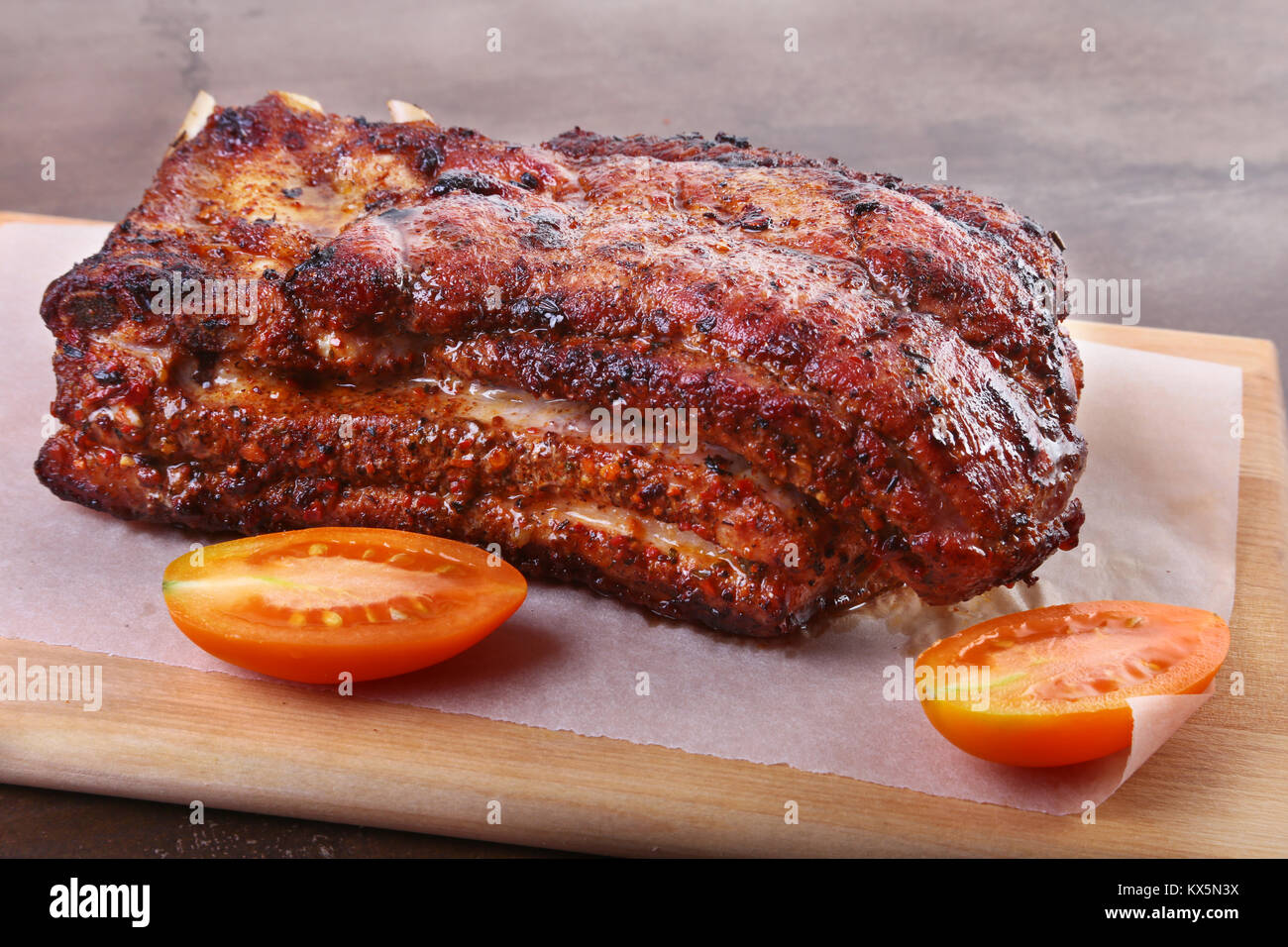 grilled pork chops with tomato and ketchup on plate Stock Photo - Alamy