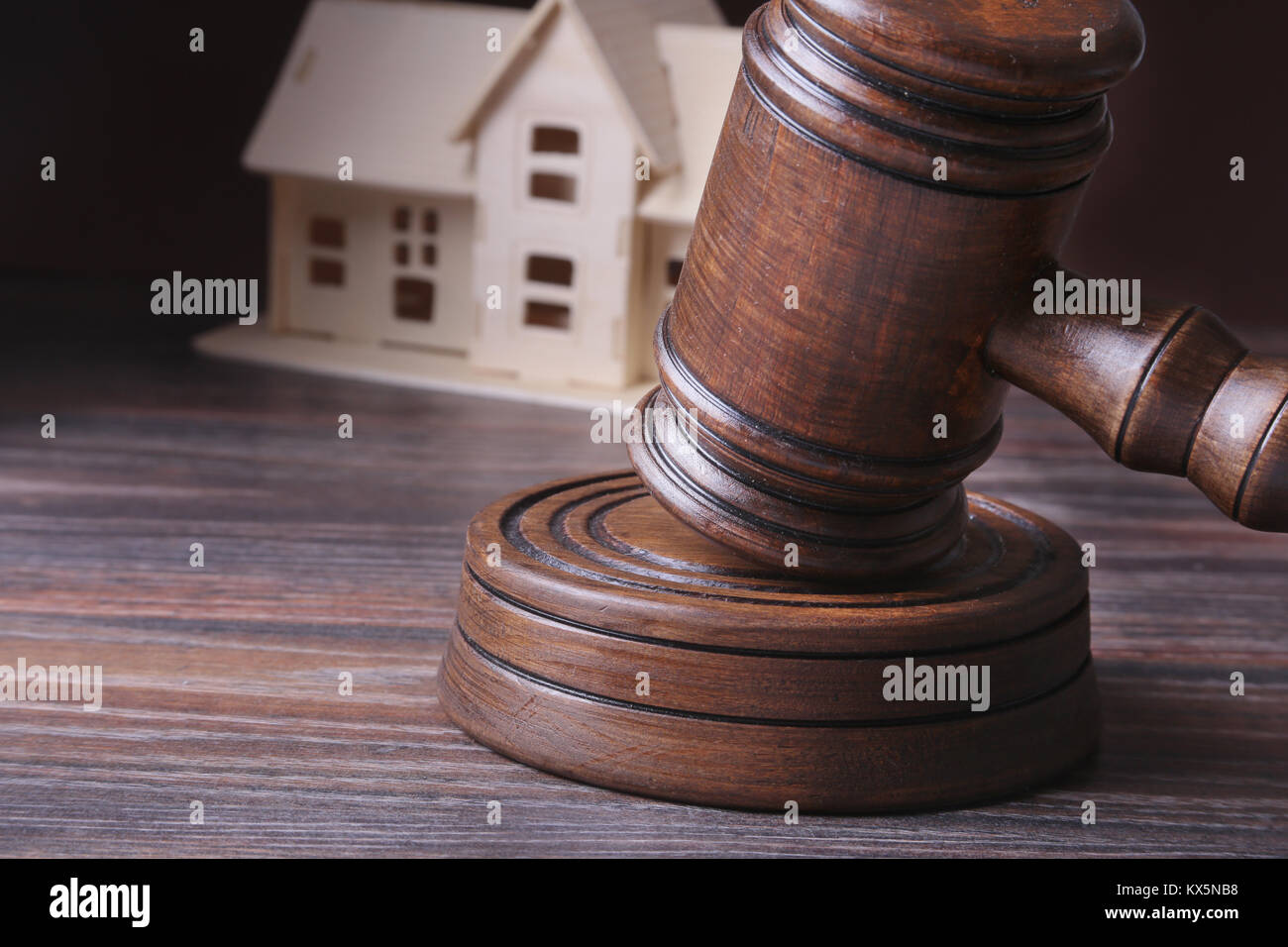 House Auction, auction hammer , symbol of authority and Miniature house ...