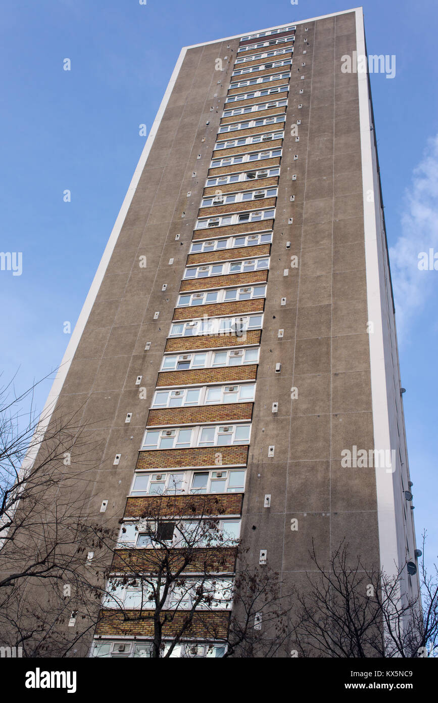 Tall council flat tower block of apartments in brutalist style viewed ...