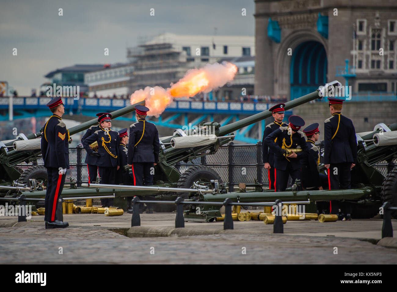 Gun crews fire Queens Birthday Gun Salute at the Tower of London Stock ...