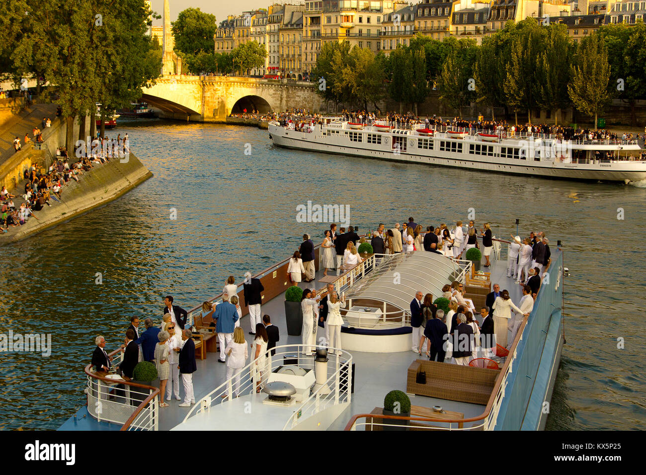Group on a boat tour on the Seine river Stock Photo - Alamy