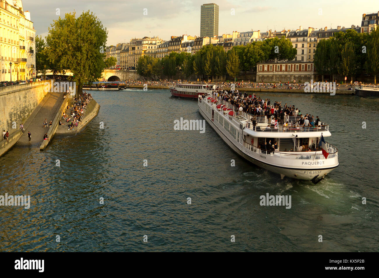 Group on a boat tour on the Seine river Stock Photo - Alamy