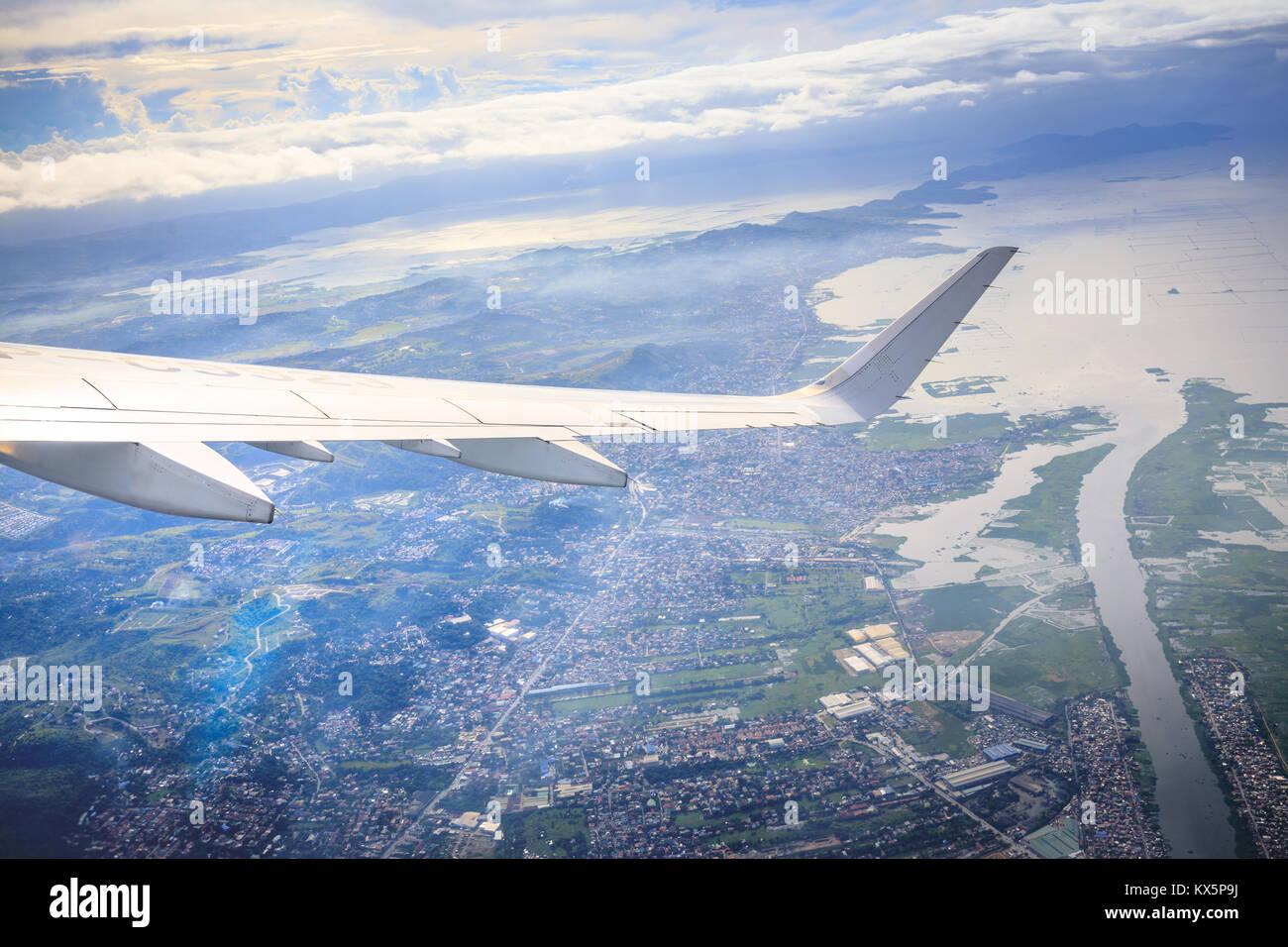 Aerial view of Manila area as seen from the airplane on a sunny day ...