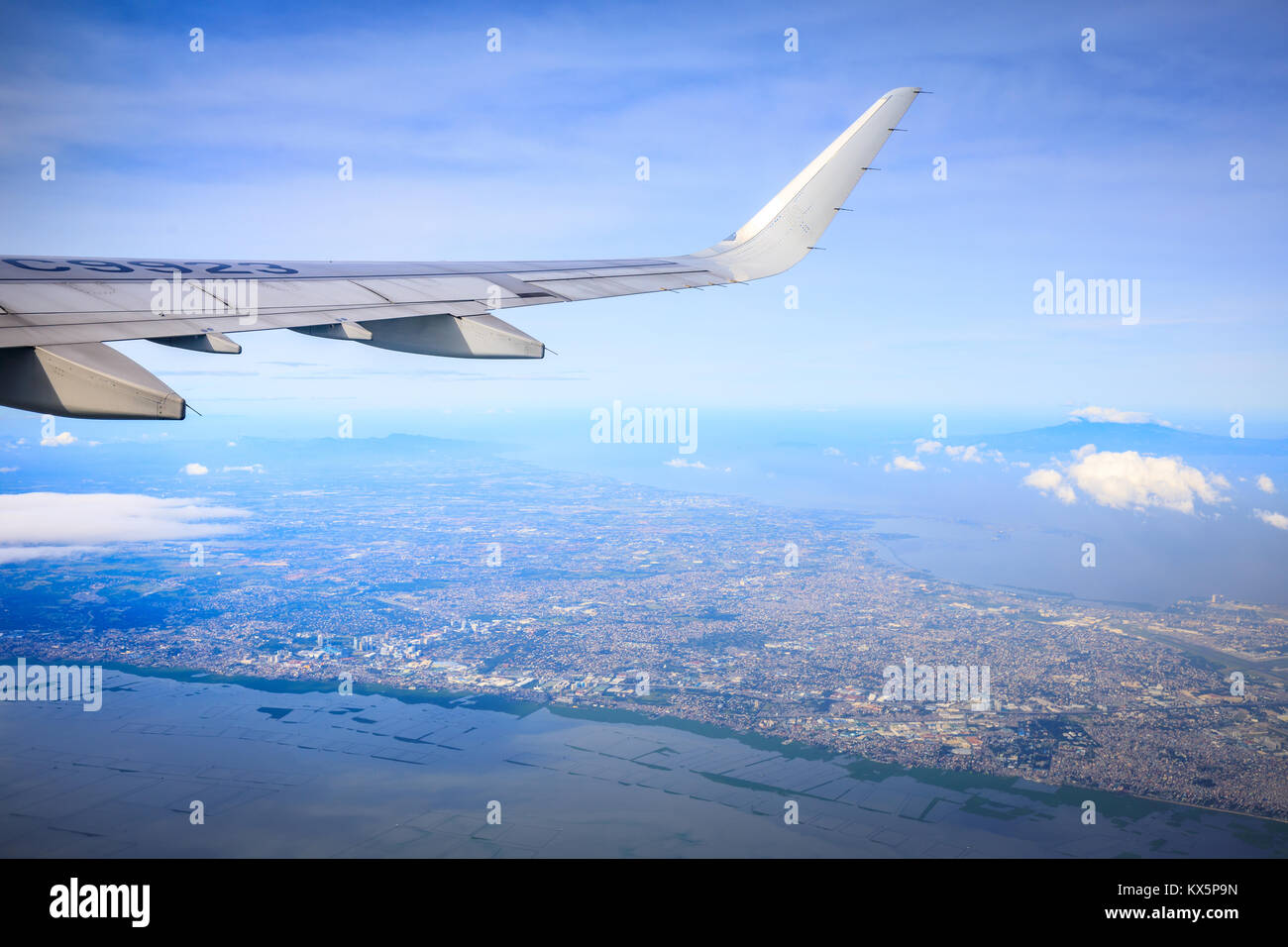 Aerial view of Manila area as seen from the airplane on a sunny day ...