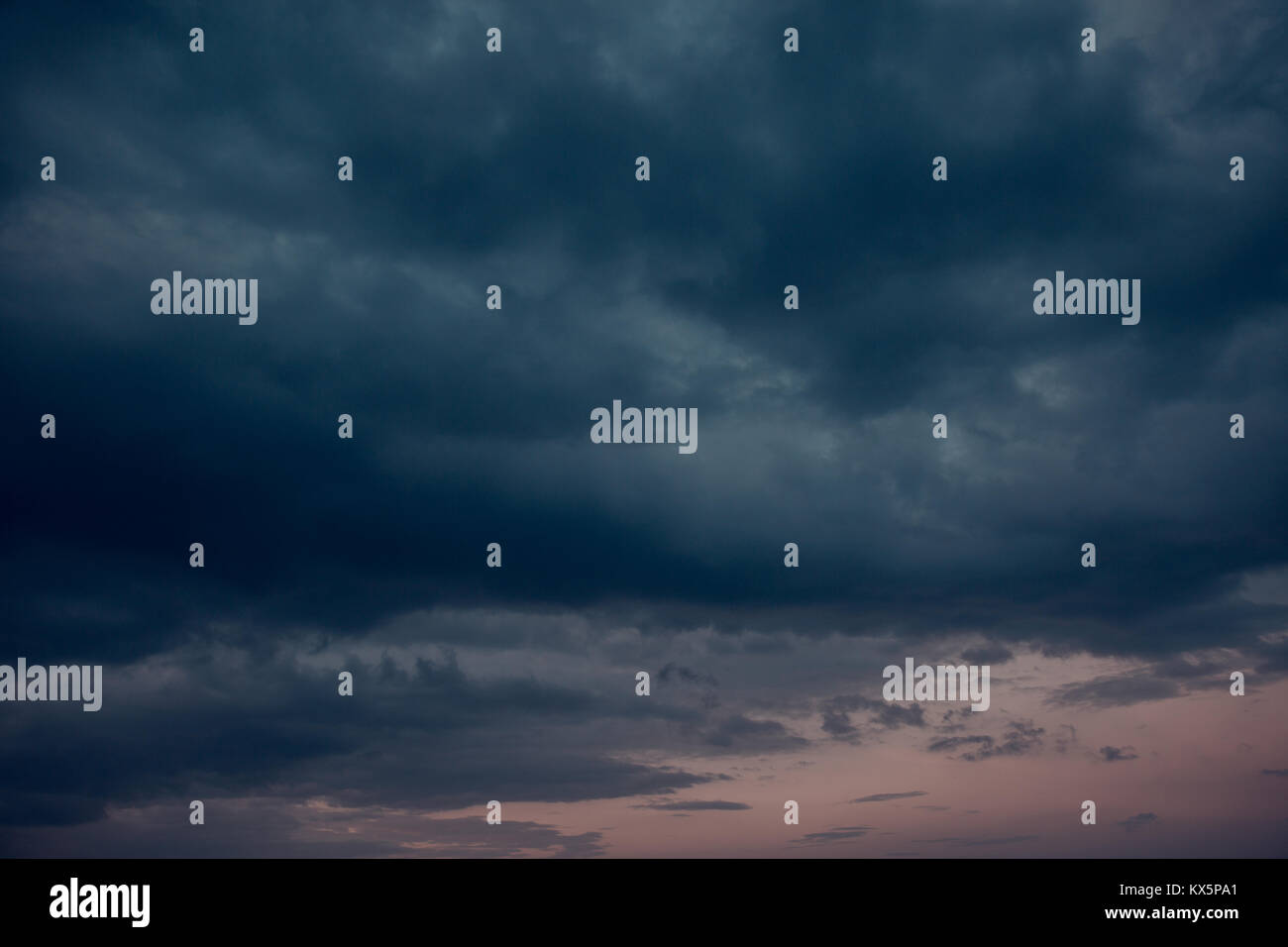 Sunset sky, dramatic look, pink clouds, no sun Stock Photo - Alamy