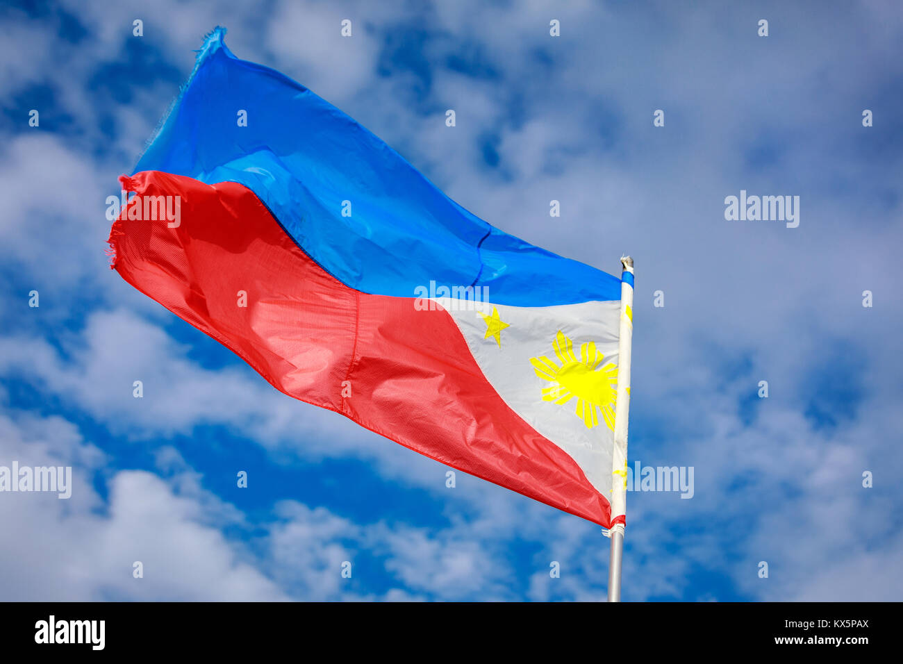 Philippines flag on flag pole hi-res stock photography and images - Alamy