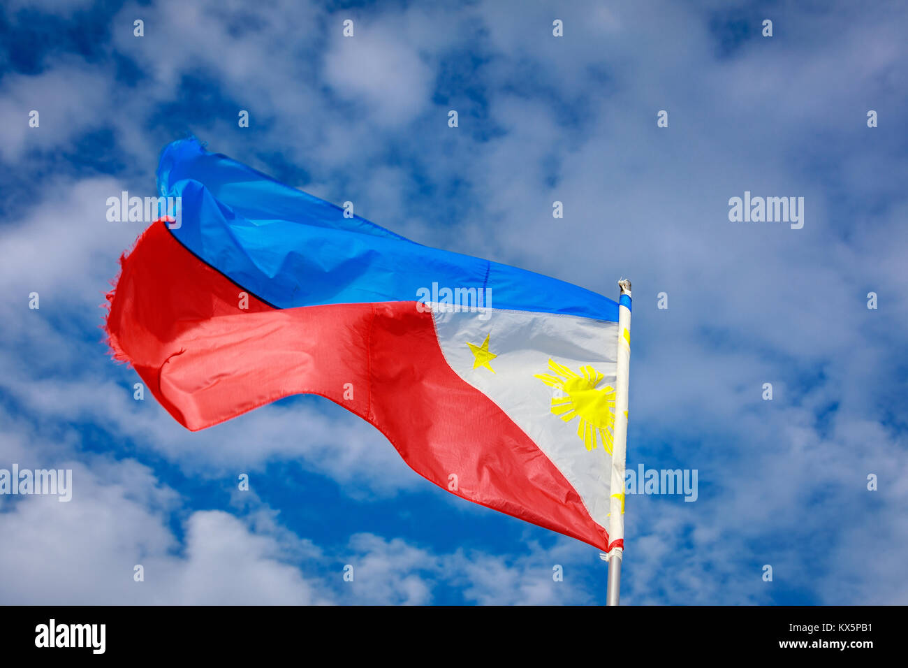 Philippines flag on flag pole hi-res stock photography and images - Alamy