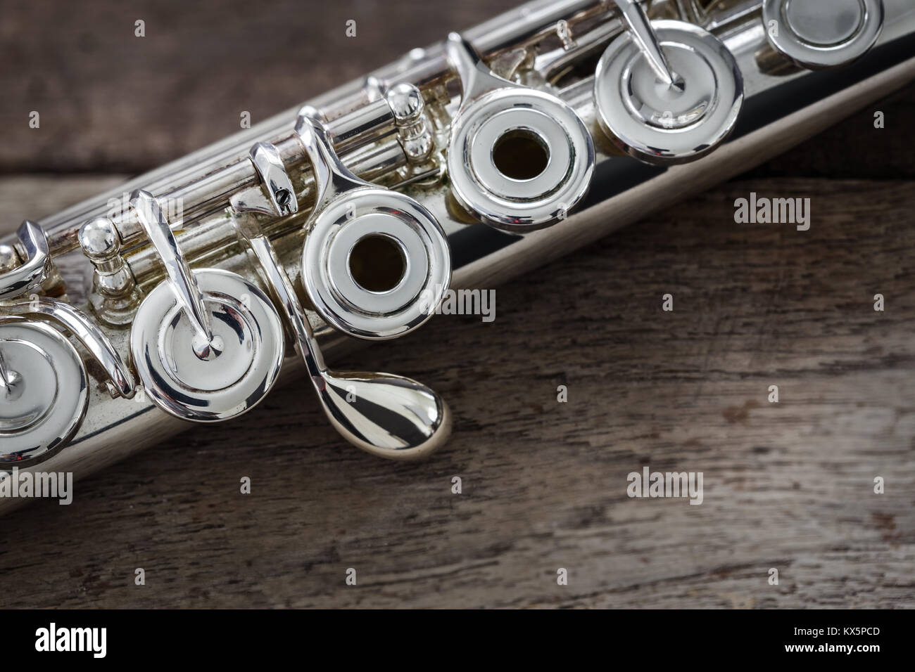 Modern Concert Flute on a Wood Table Stock Photo - Alamy