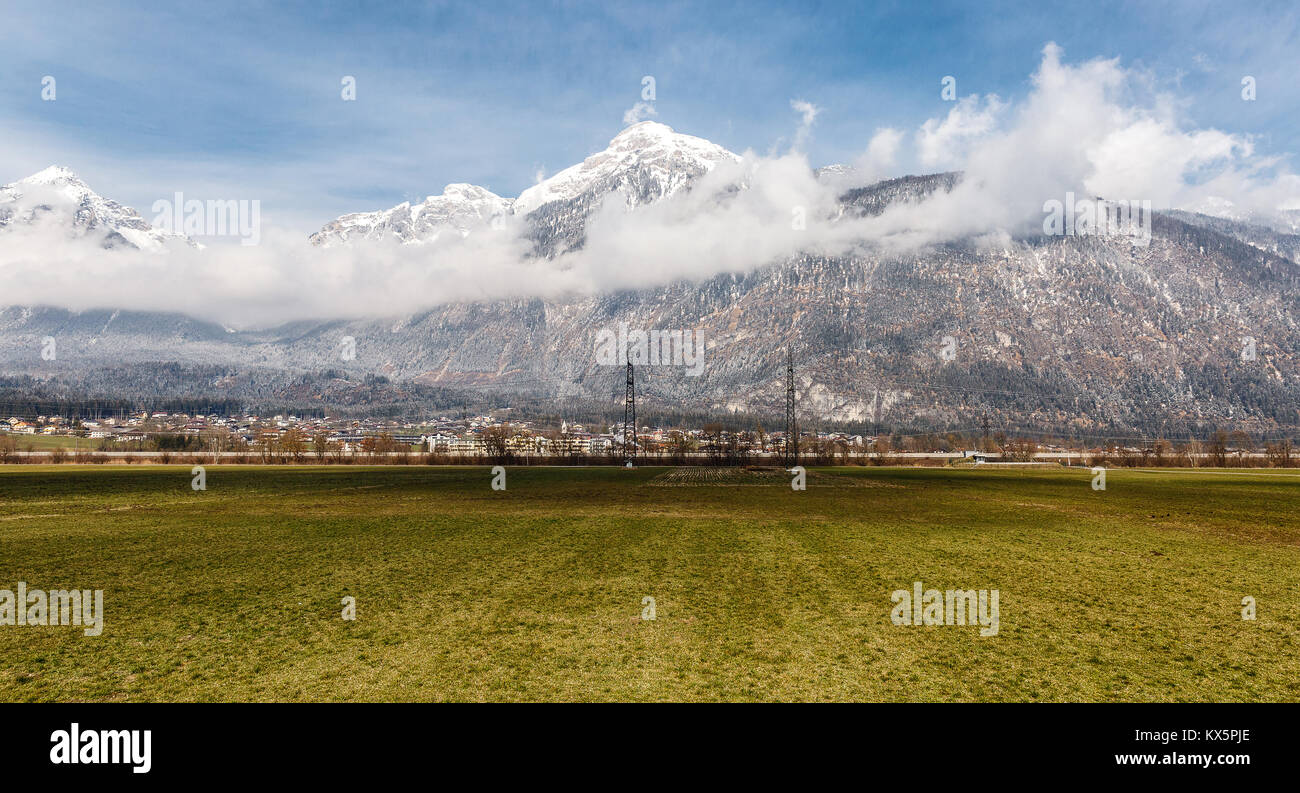 snowy mountain peak with village in autumn and spring, Europe travel ...