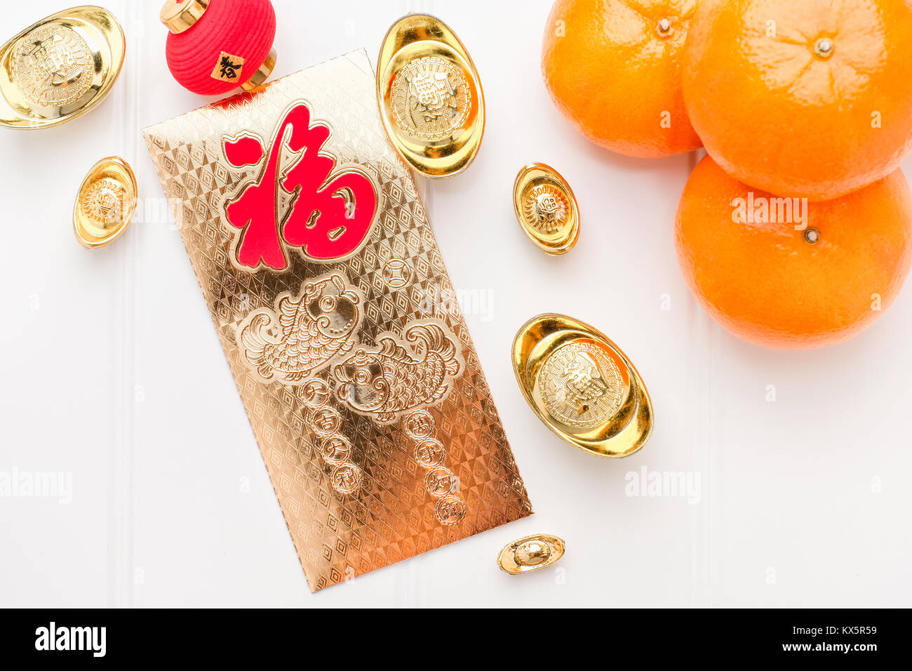 Top view Chinese New year golden envelope packet ( ang pow ) with gold ...