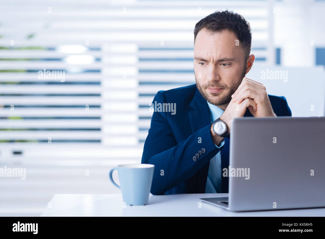 Employee sitting in front hi-res stock photography and images - Alamy