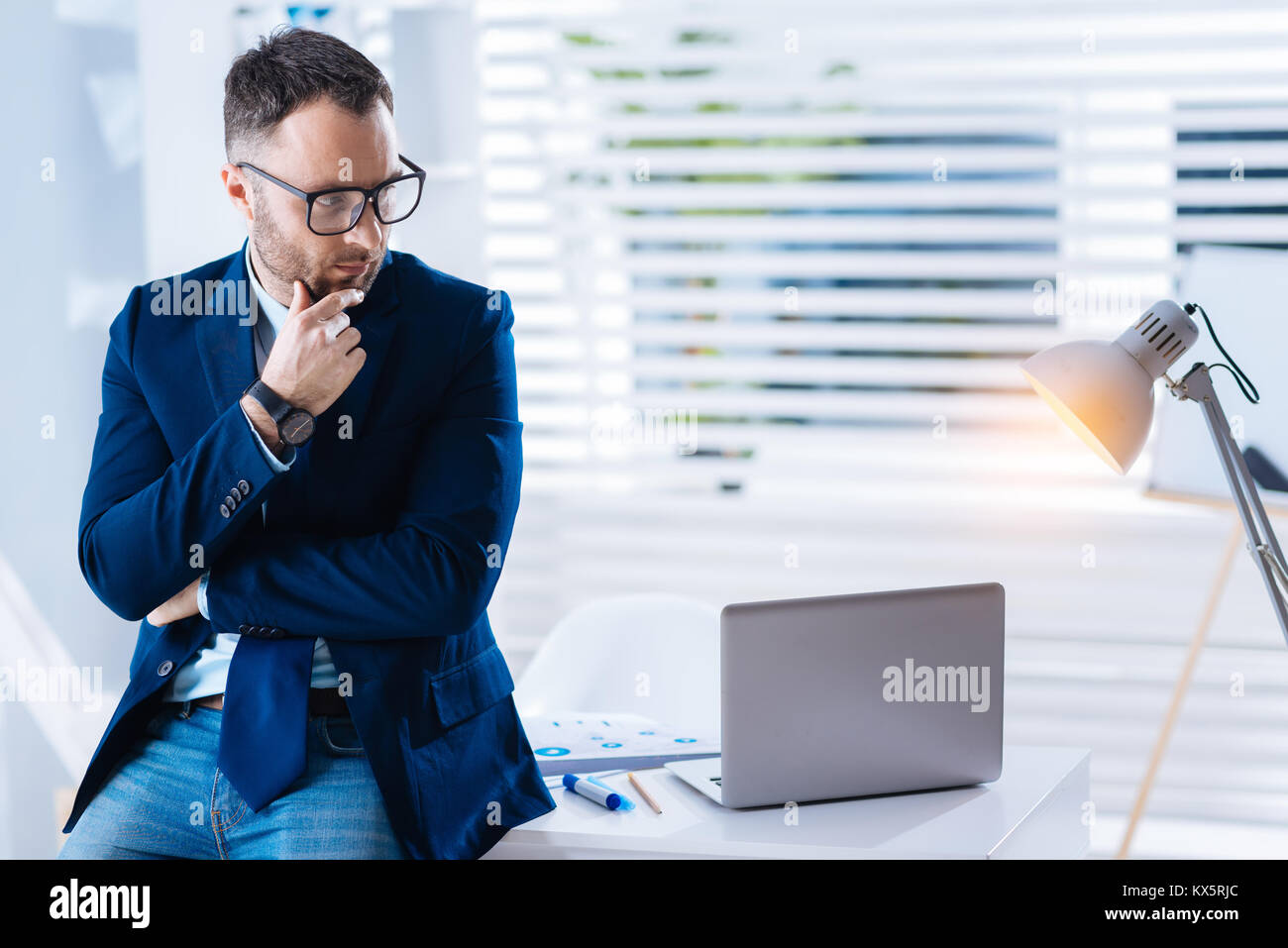 Smart man with glasses hi-res stock photography and images - Alamy