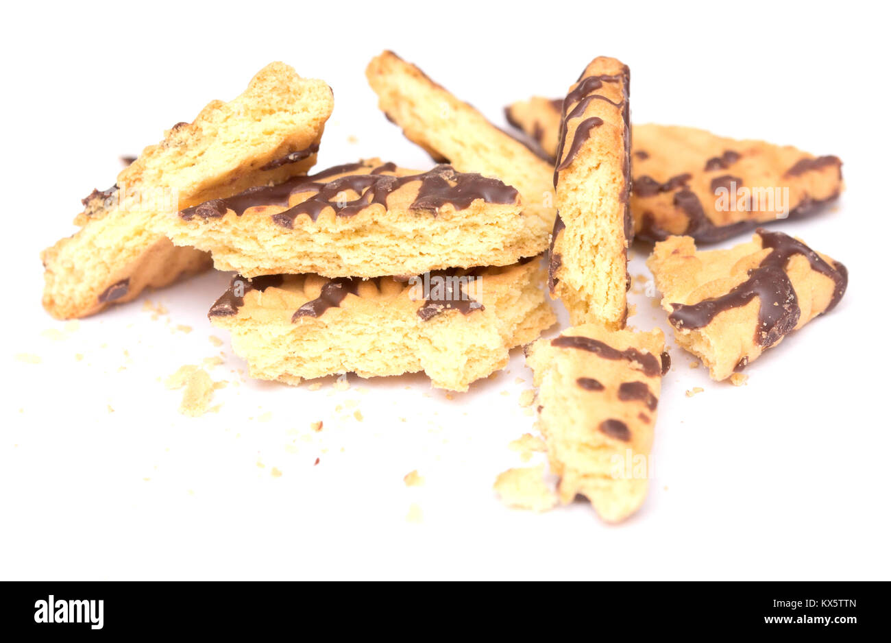 Crumbled cookie on white background Stock Photo - Alamy