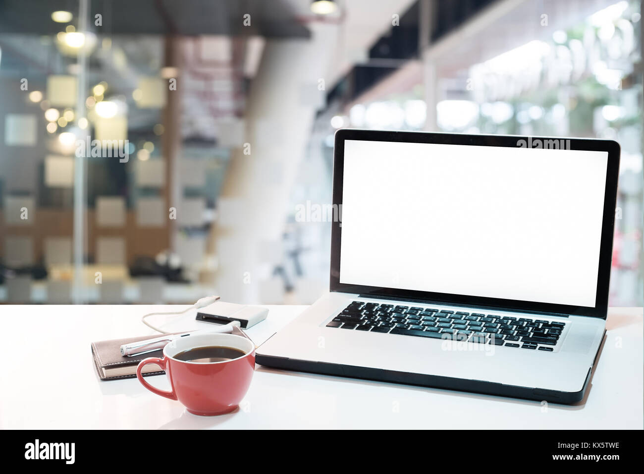 Computer laptop on workplace with office blur background with empty ...