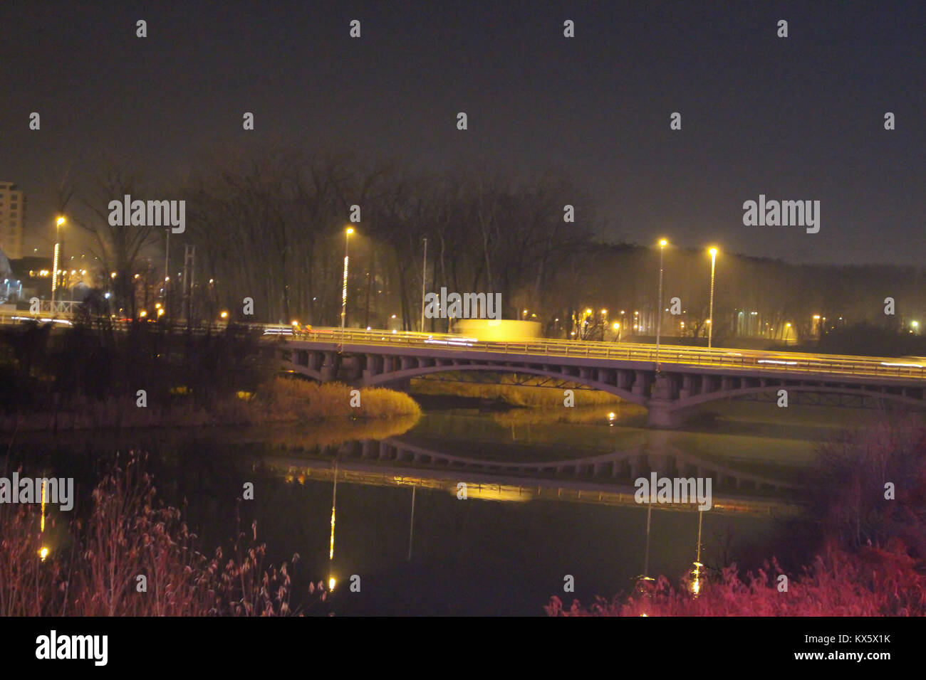 Red and blue yangtze river bridge and high rise building hi-res stock ...