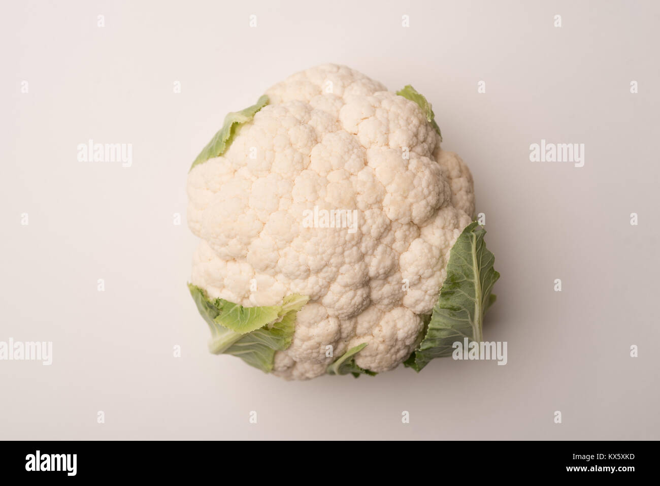 Close up of a ripe cauliflower isolated over white background Stock ...