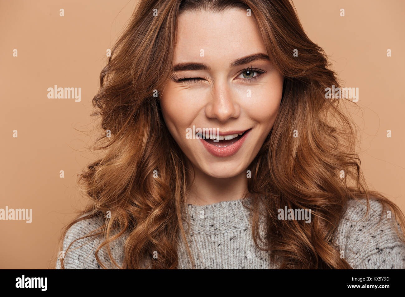 Woman blinking eye hi-res stock photography and images - Alamy