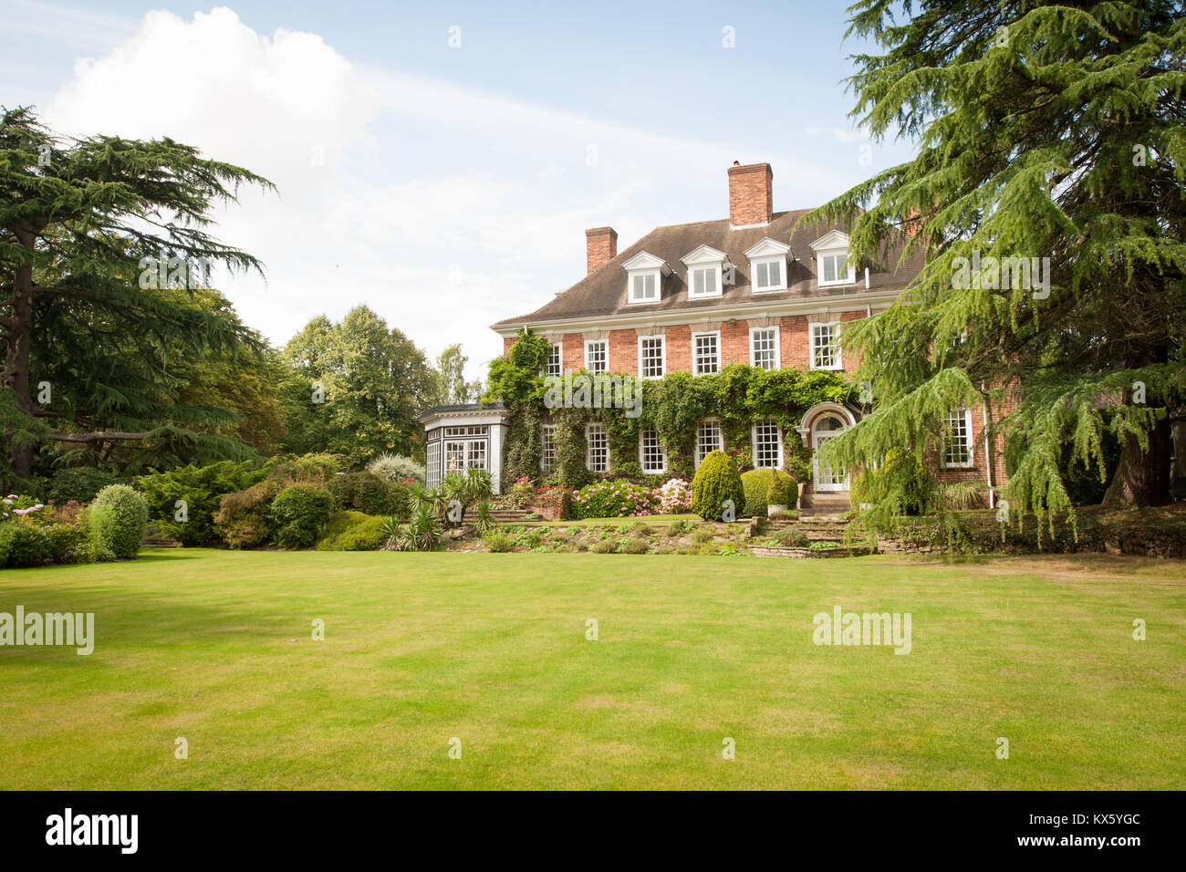Large house on a private road Stock Photo - Alamy