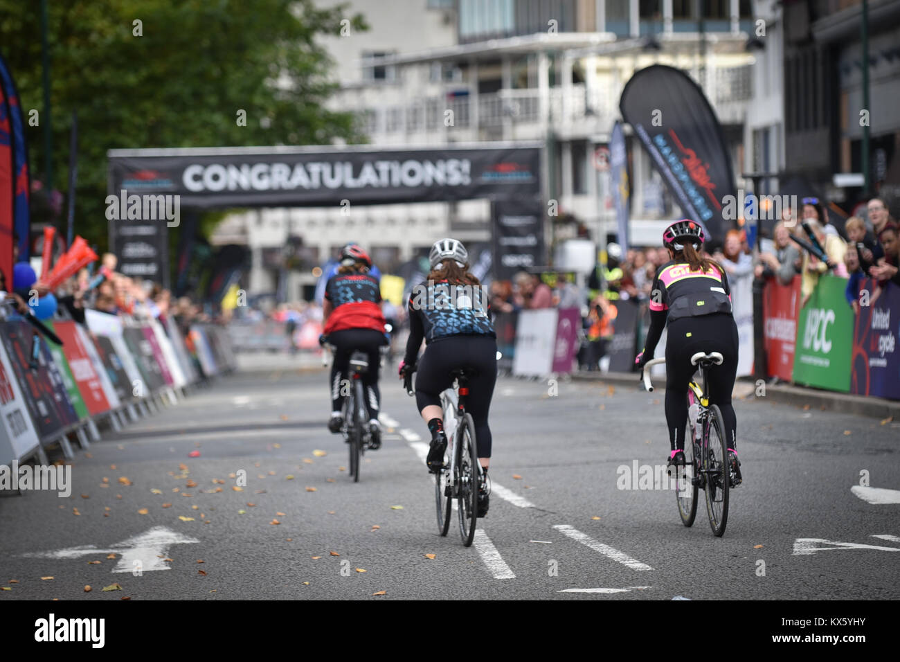 cyclists reach the finish line Stock Photo - Alamy