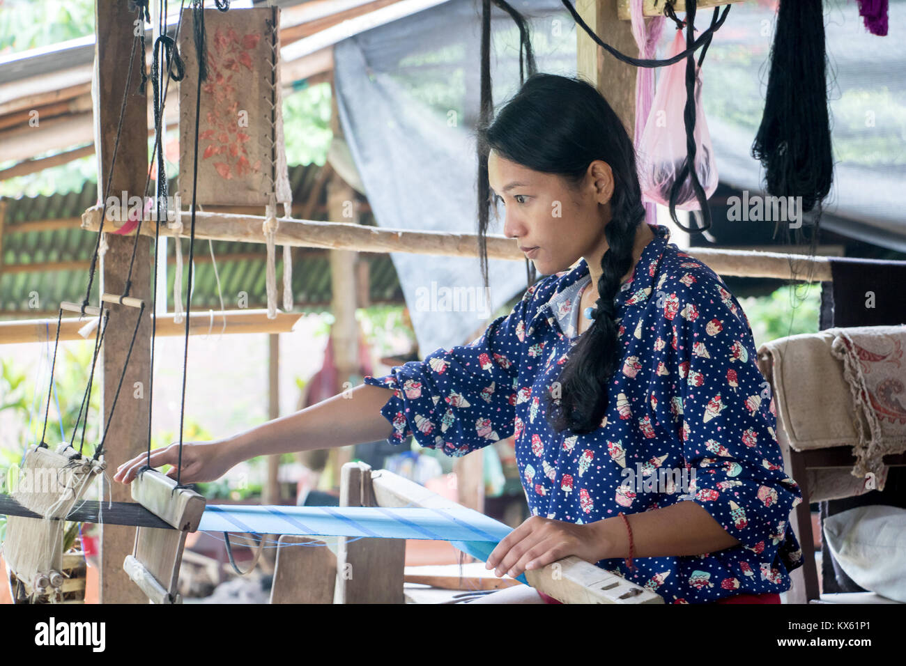 Asian woman on weaving machine hi-res stock photography and images - Alamy