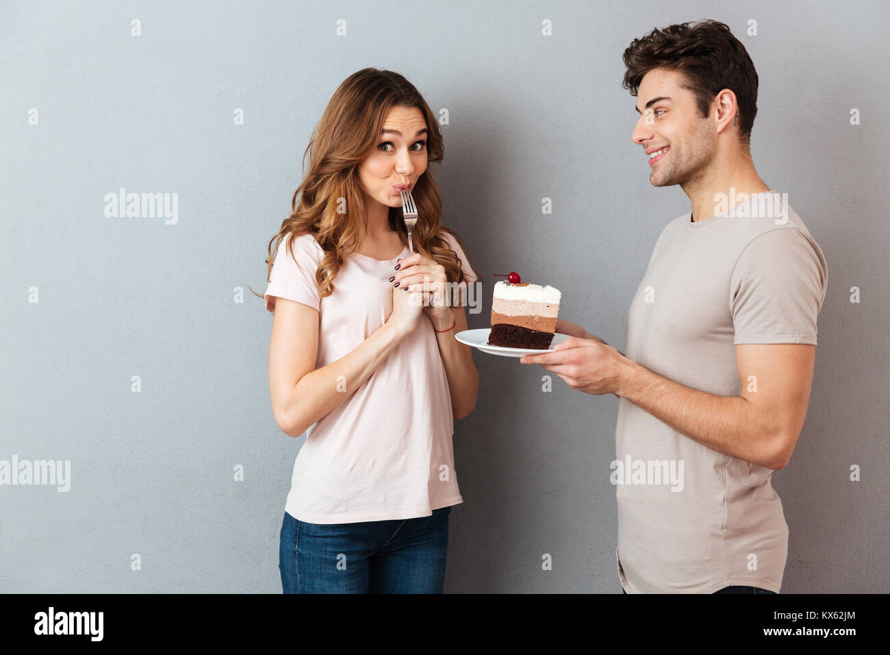 Man giving girlfriend cake hi-res stock photography and images - Alamy