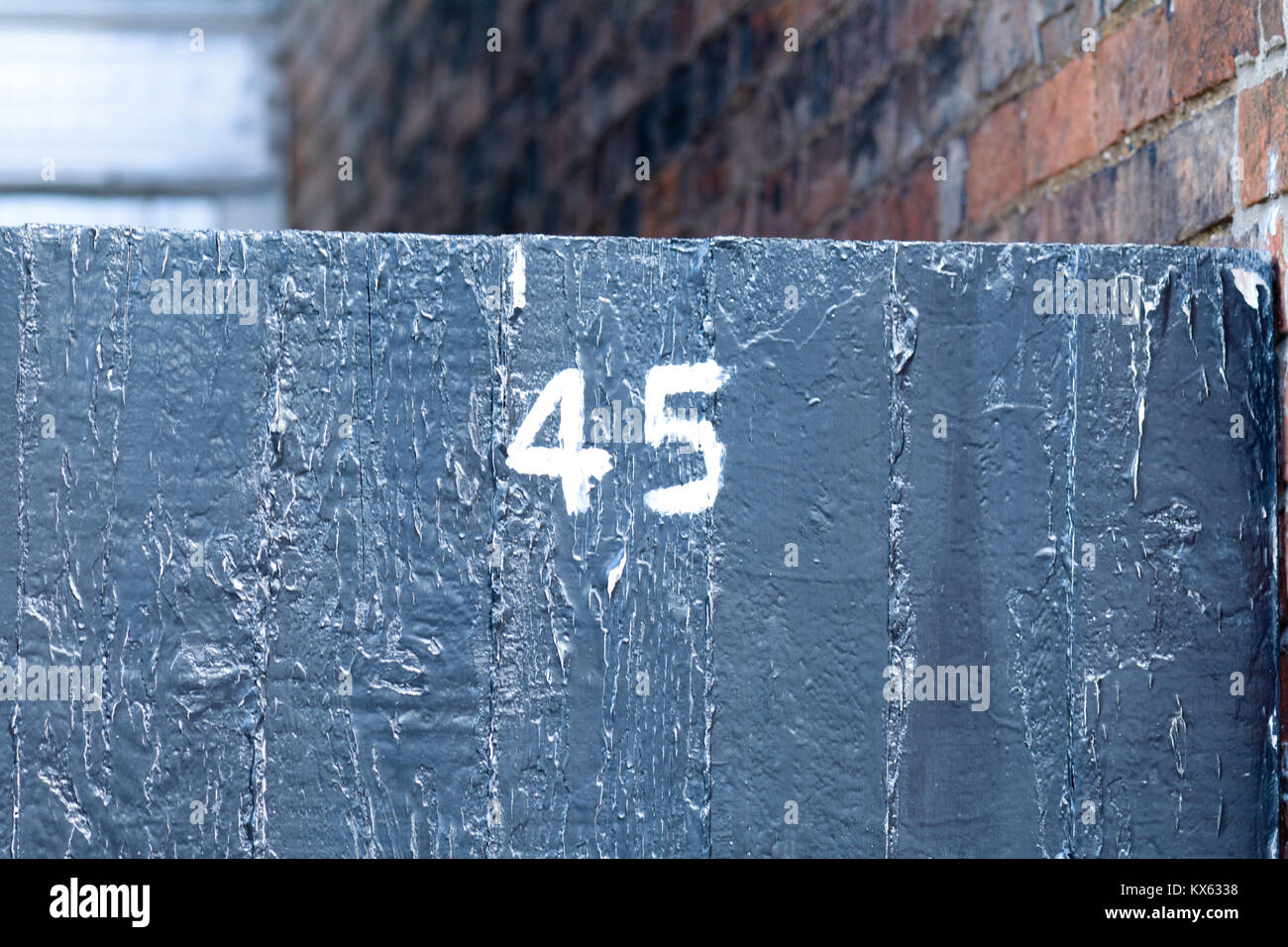 House number 45 painted sign on gate hi-res stock photography and ...
