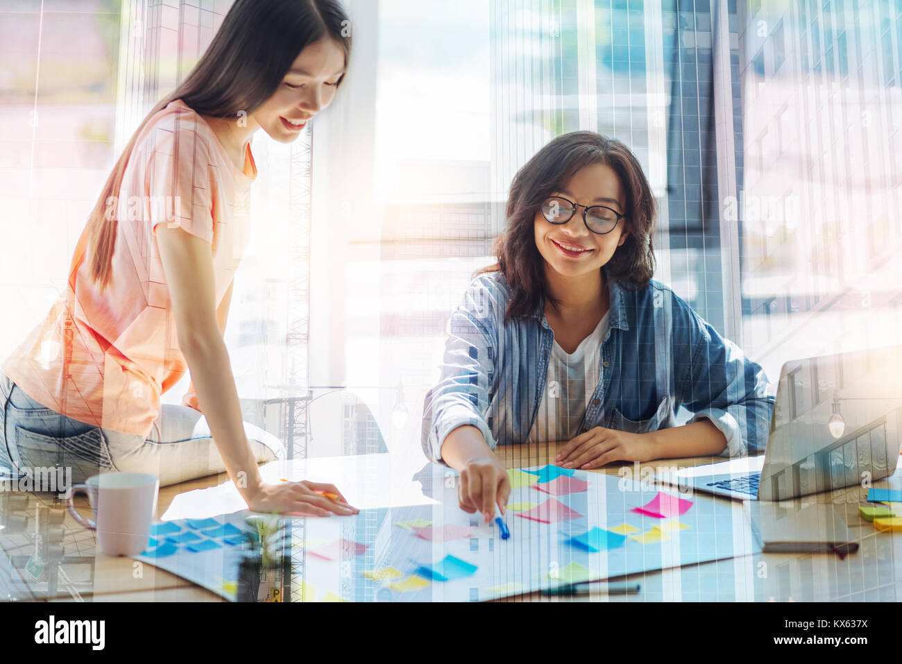 Collaboration in workplace hi-res stock photography and images - Alamy